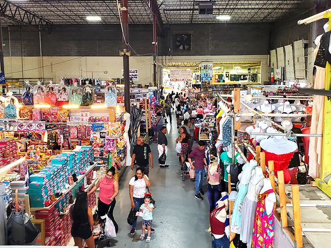 The indoor treasure hunt begins! Crowds navigate this labyrinth of bargains where one person's castoffs become another's prized possessions.