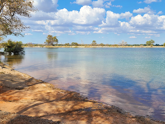 Crystal clear waters stretch to the horizon, proving that sometimes the best beaches aren't anywhere near an ocean. Oklahoma's liquid surprise.