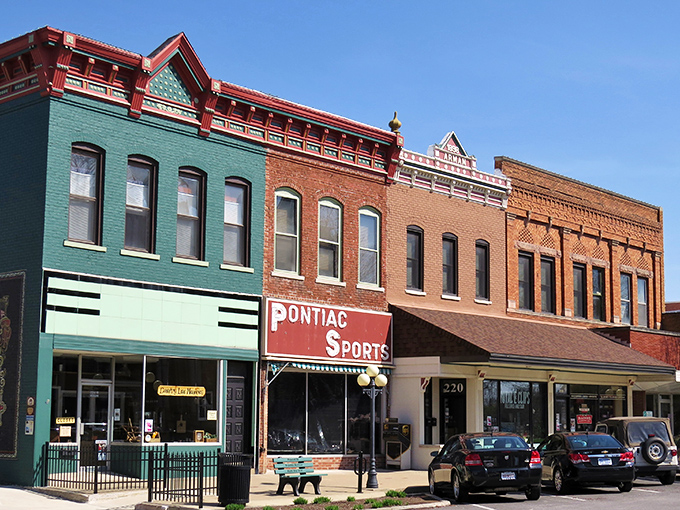 A classic car cruises past Pontiac's pristine brick buildings, like a scene from a time when gas was cheap and smartphones were science fiction.