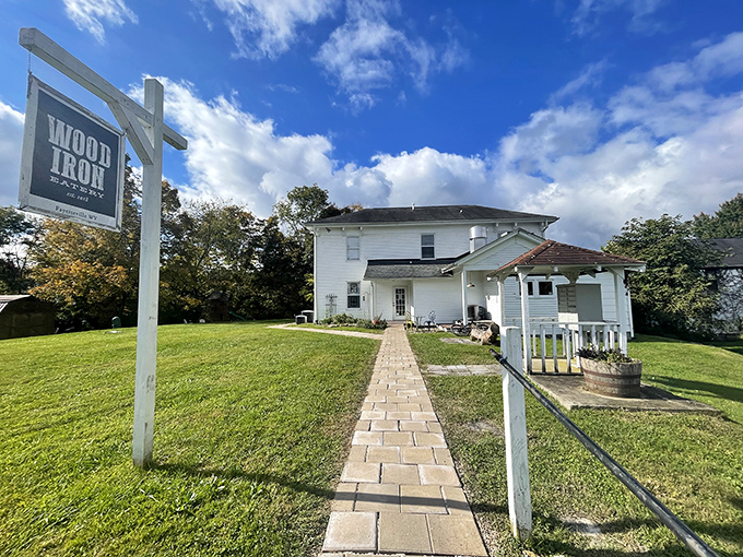 The journey to breakfast bliss begins with this charming white farmhouse. A wooden walkway practically begs you to follow it toward culinary adventure.