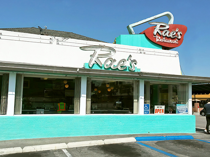 The turquoise-trimmed time capsule beckons with its vintage neon sign &ndash; a beacon of breakfast hope on Pico Boulevard where pancake dreams come true.
