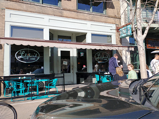The turquoise chairs outside Ladybird Diner aren't just seating&mdash;they're an invitation to slow down and savor life one pancake at a time.