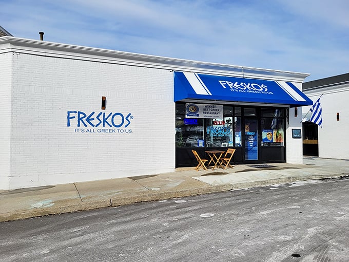 The iconic blue awning of Freskos stands out like a beacon of Mediterranean promise, complete with sunny outdoor seating for those perfect Connecticut afternoons.