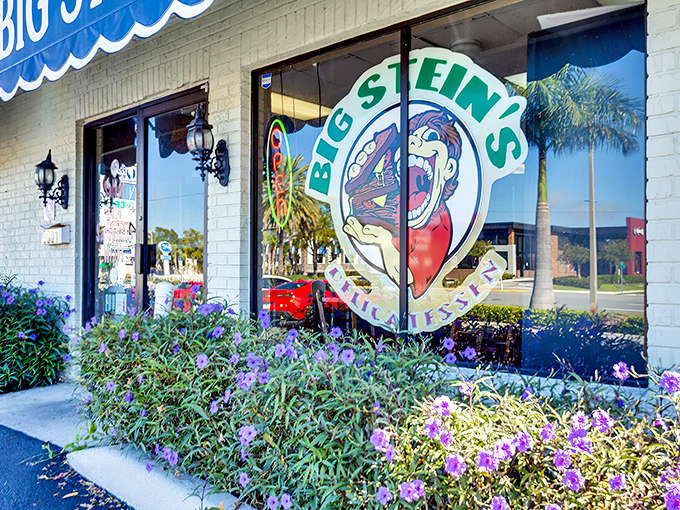 Welcome to sandwich paradise! Big Stein's Deli's cheery blue awning beckons like a siren song to hungry passersby. Resistance is futile, my friends. 