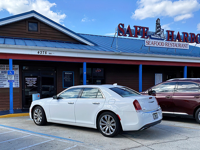 The unassuming exterior of Safe Harbor belies the seafood treasures within. That metal roof has weathered more Florida storms than a weatherman's hairpiece.