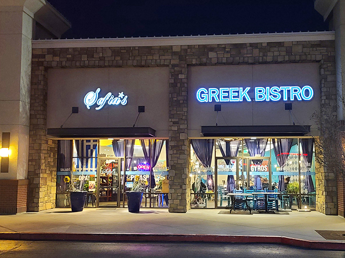 Sofia's Greek Bistro welcomes hungry travelers with its stone facade and bright blue umbrellas—a little slice of Santorini in suburban Garden City.