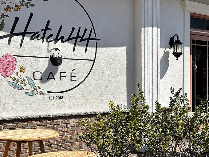 Hatch44's pristine white exterior with striped awnings isn't just inviting&mdash;it's practically winking at you to come inside for breakfast magic.