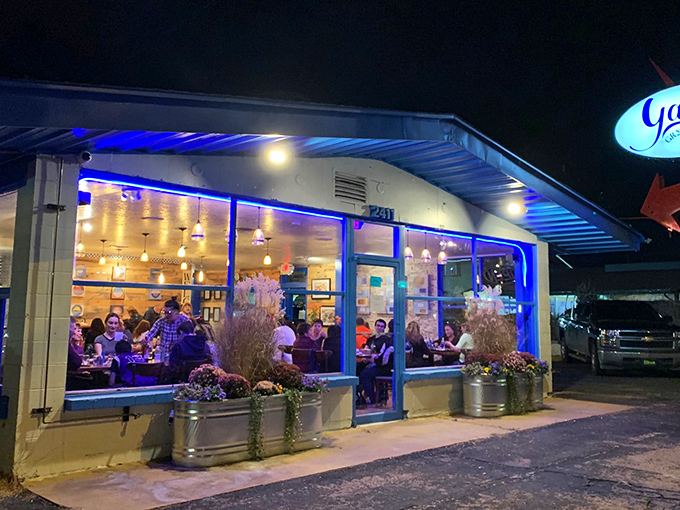 The blue-trimmed exterior of Yamas stands out like a Mediterranean oasis in Santa Fe, complete with that can't-miss red arrow guiding hungry travelers home.