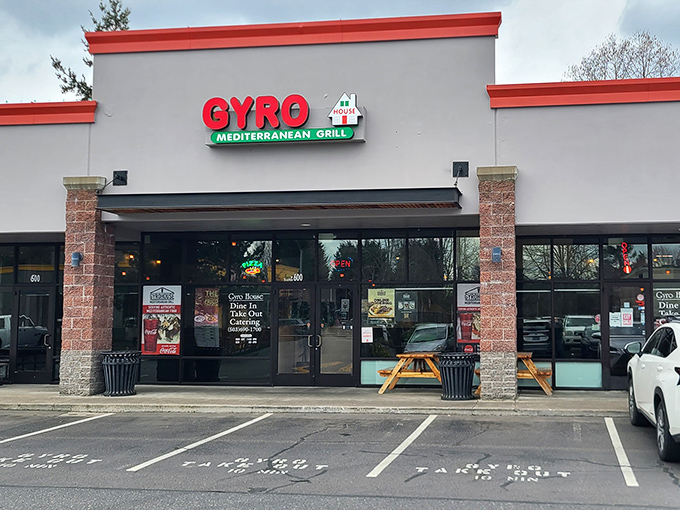 The unassuming storefront of Gyro House Mediterranean Grill stands like a beacon of flavor in Beaverton's retail landscape. Mediterranean magic awaits inside.
