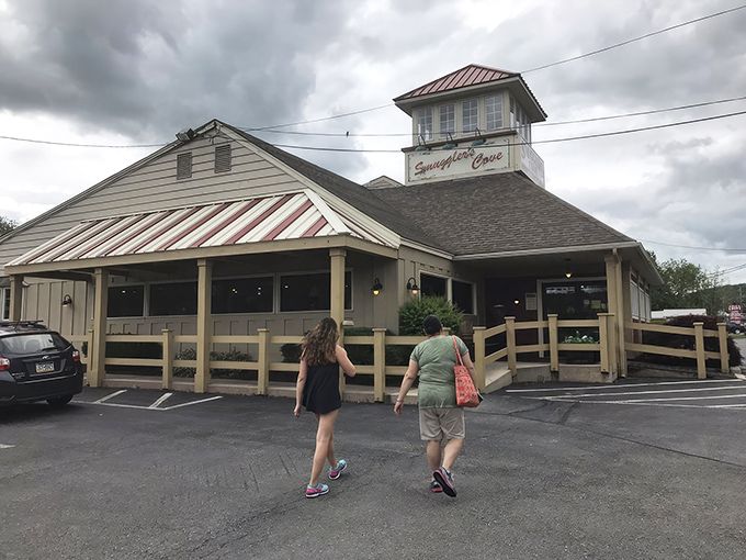 The lighthouse-inspired cupola atop Smuggler's Cove beckons hungry travelers like a beacon of seafood salvation in the Pocono Mountains. 
