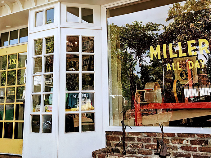 A glimpse of paradise through paned windows&mdash;Millers All Day's inviting exterior promises breakfast bliss behind that cheerful yellow door.