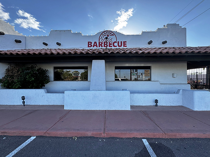 The white adobe exterior of Eric's Family Barbecue stands like a barbecue beacon against the Arizona sky, promising smoky treasures within.