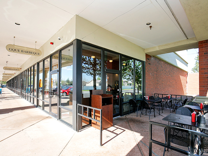 The unassuming storefront hides barbecue greatness like Clark Kent hides Superman. This brick-and-stone facade houses smoky treasures worth crossing county lines for.