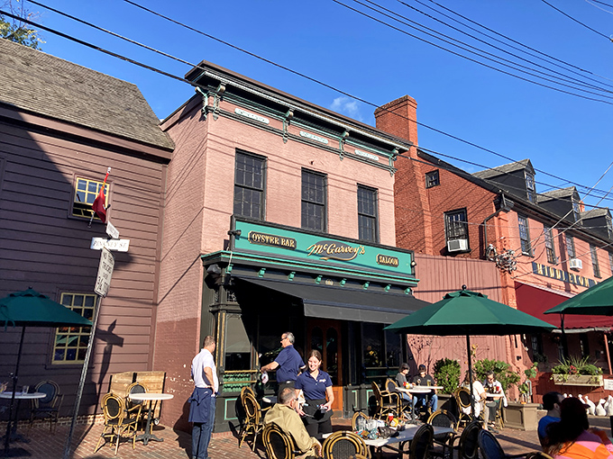 McGarvey's pink brick exterior with its signature green awning stands as a beacon for seafood lovers in historic downtown Annapolis.