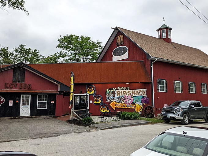The red barn exterior of KC's isn't trying to impress you—until you step inside and the BBQ aroma makes your knees weak.