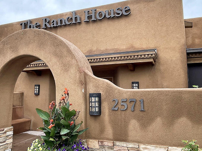 Adobe walls and southwestern charm welcome you to The Ranch House, where Santa Fe's best-kept BBQ secret hides behind an unassuming facade.