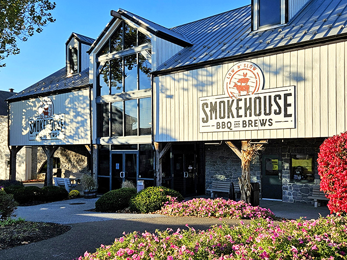 The barn-inspired architecture of Smokehouse BBQ & Brews stands proudly against the Pennsylvania sky, promising smoky delights within those wooden walls.