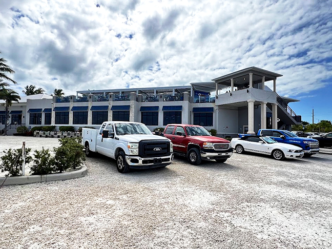 A gleaming white sanctuary of seafood awaits at Whale Harbor, standing like a maritime palace against the Florida Keys sky.
