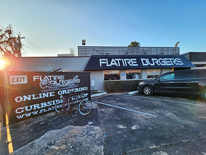 The unassuming exterior of Flatire Burgers belies the culinary magic happening inside. Like finding a diamond in a parking lot.