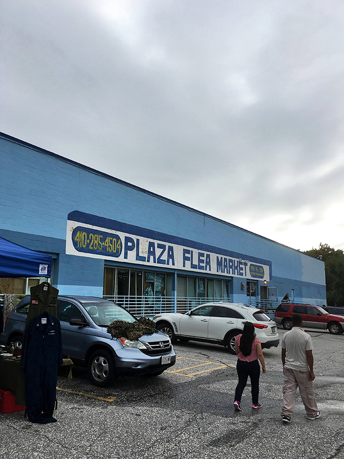 The blue facade of Plaza Flea Market beckons like a retail Narnia&mdash;where your wallet enters full and exits empty, but your heart does the opposite.