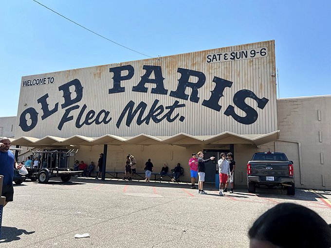 The iconic blue sign beckons treasure hunters like a siren call. Oklahoma City's Old Paris Flea Market promises adventures that no online shopping cart can deliver.