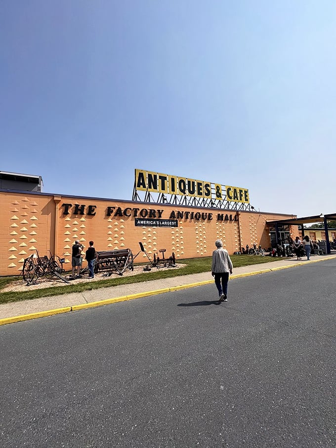 The sunshine-yellow exterior of Factory Antique Mall beckons like a beacon to treasure hunters.