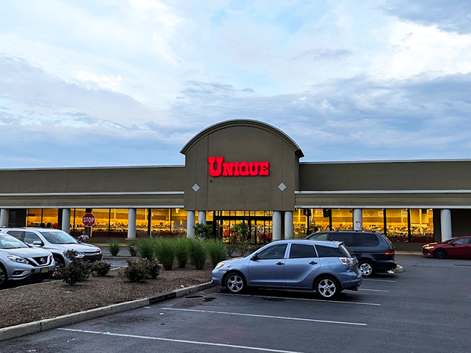 The green-trimmed fa&ccedil;ade with its bold red sign isn't just inviting shoppers &ndash; it's practically daring you to discover what treasures await inside.