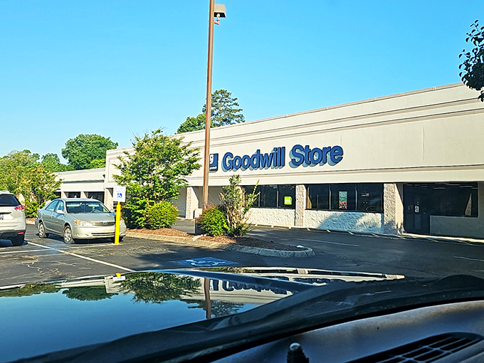 The iconic blue and white facade of Goodwill Industries on Kingston Pike stands like a beacon for treasure hunters across Knoxville, promising adventures in secondhand splendor.
