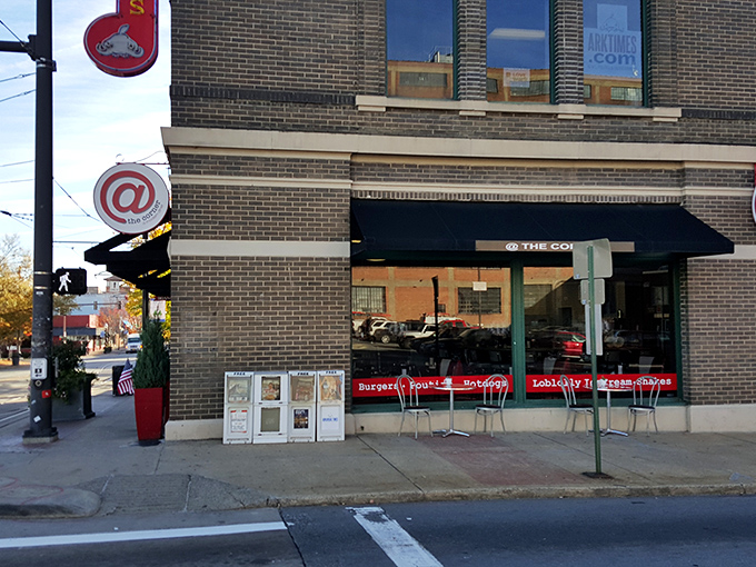 The iconic @ symbol beckons from this brick corner spot in downtown Little Rock, promising modern diner delights with a side of urban charm.