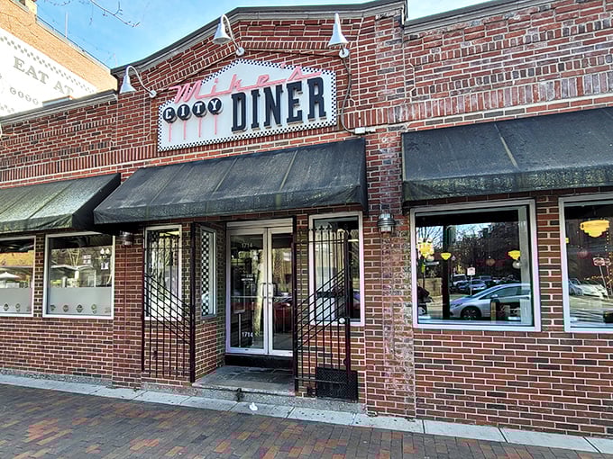 The brick fa&ccedil;ade of Mike's City Diner stands like a beacon of breakfast hope on Washington Street, promising culinary salvation to hungry Bostonians.