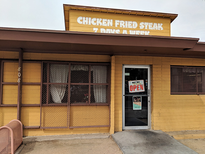 The mustard-yellow exterior boldly proclaims its specialty in no uncertain terms. When a place advertises "CHICKEN FRIED STEAK 7 DAYS A WEEK," you know they mean business.