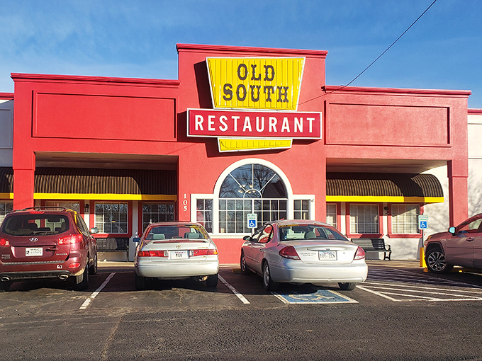 The bright red exterior with bold yellow signage isn't trying to be subtle &ndash; it's proudly announcing "good food happens here!" No Instagram filter required.