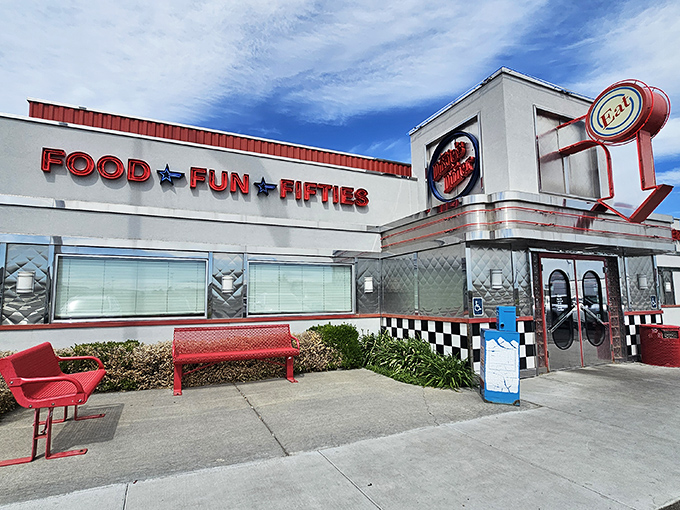 The bright red "FOOD ★ FUN ★ FIFTIES" sign isn't just advertising&mdash;it's a time portal promising your stomach the vacation it deserves.
