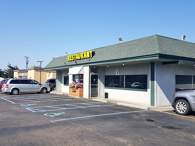 The unassuming exterior of Four Korners Restaurant proves once again that culinary treasures often hide in plain sight. Michigan's comfort food sanctuary awaits. 