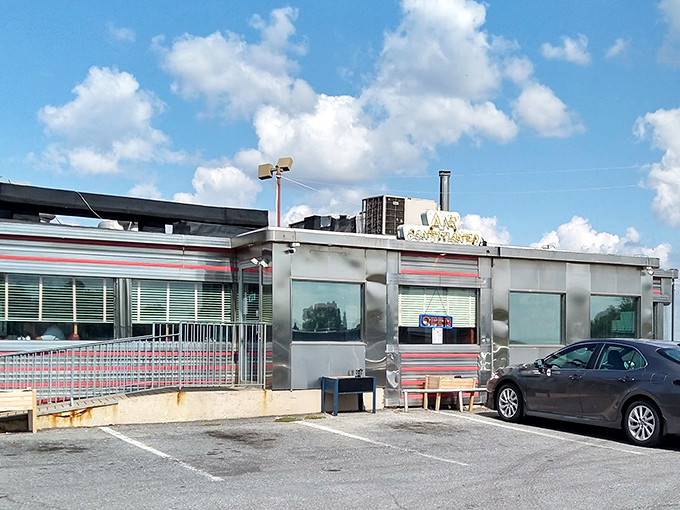 The gleaming stainless steel exterior of Route 30 Diner stands like a time capsule under Pennsylvania skies, promising comfort food that transcends decades.