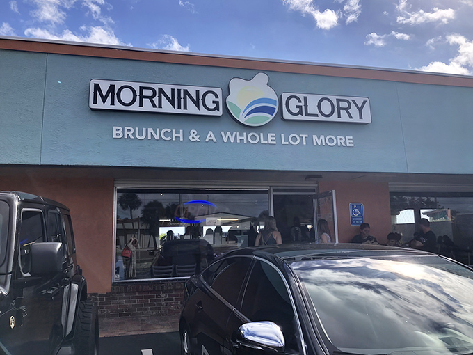 The bright blue exterior of Morning Glory serves as a beacon for breakfast enthusiasts seeking their morning salvation in Satellite Beach.