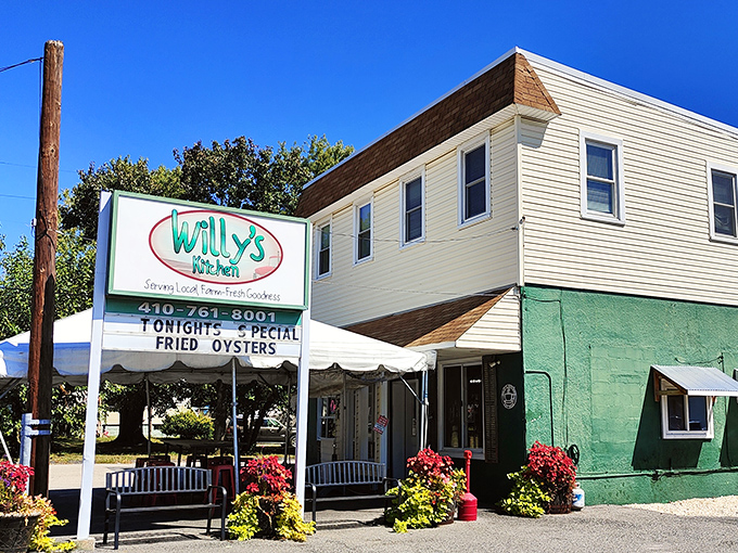 The mint-green exterior of Willy's Kitchen stands like a culinary lighthouse in Glen Burnie, promising farm-fresh goodness and tonight's special: fried oysters that would make Poseidon jealous.