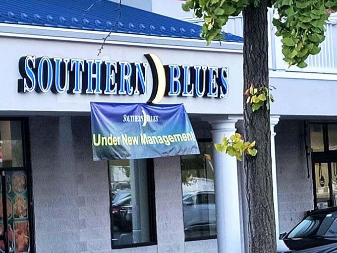 The bright blue sign with its cheerful yellow moon beckons like a lighthouse for the hungry soul. Southern comfort awaits inside.