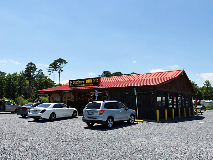 The humble wooden exterior of Smoker's BBQ Pit belies the flavor explosion waiting inside. Beach vacations need this kind of unpretentious barbecue sanctuary.
