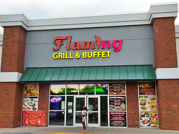The humble brick facade of Flaming Grill & Buffet belies the culinary wonderland waiting inside. First rule of buffet club: never judge by the exterior.