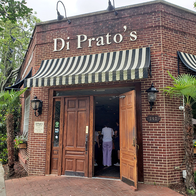 Welcome to sandwich paradise! DiPrato's brick exterior and striped awning promise a feast for the senses within.