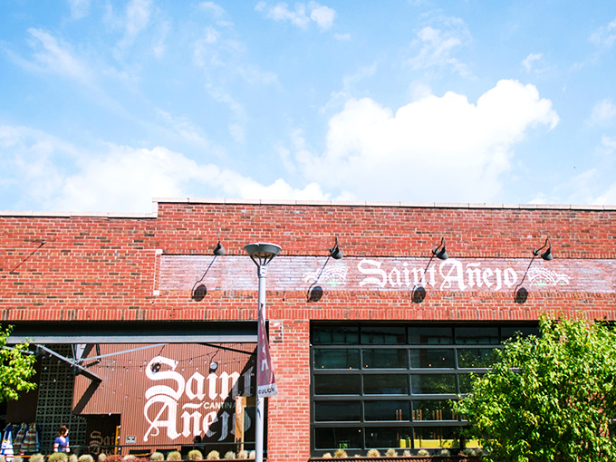 Saint Anejo's red brick exterior in Nashville's Gulch neighborhood promises culinary adventures within&mdash;like finding Mexico's soul in Tennessee's heart.