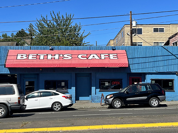 The unmistakable bright blue exterior with cherry-red awning says it all: culinary treasures don't always hide in fancy packages.