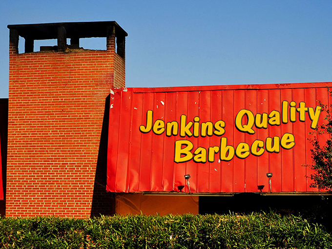 The bright yellow building with its iconic red roof stands like a barbecue beacon in downtown Jacksonville, drawing hungry pilgrims since 1957.