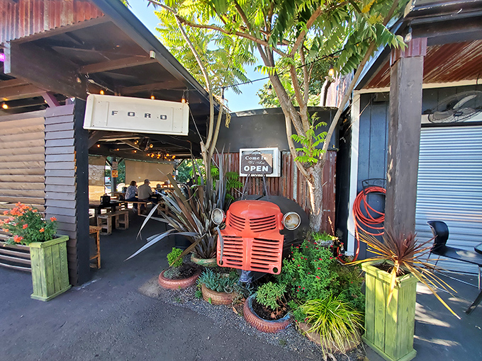 The ultimate roadside treasure hunt ends here! Junkyard's exterior promises automotive nostalgia and burger bliss under Oregon skies.
