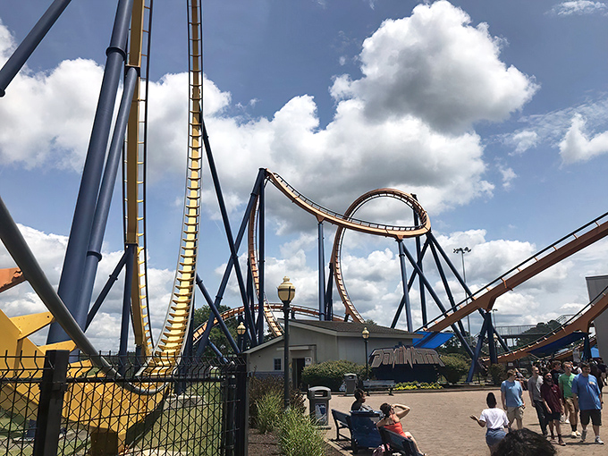 Dominator's orange and blue tracks twist like a metal pretzel gone wild. Proof that engineers have a wicked sense of humor when designing your afternoon adrenaline fix.