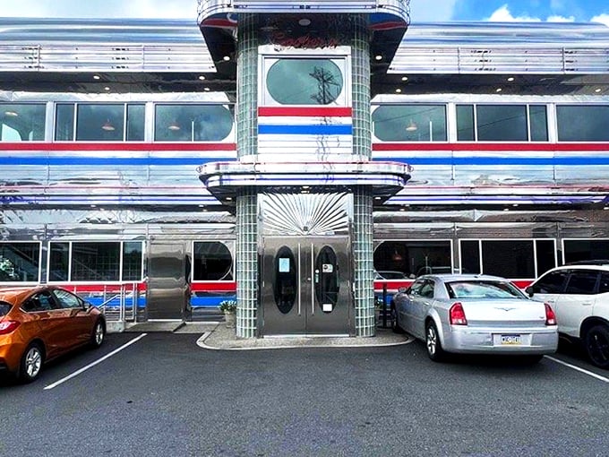 The gleaming chrome exterior of Goobers Diner shines like a beacon of nostalgia, promising a trip back to simpler times when calories didn't count and chrome was king.