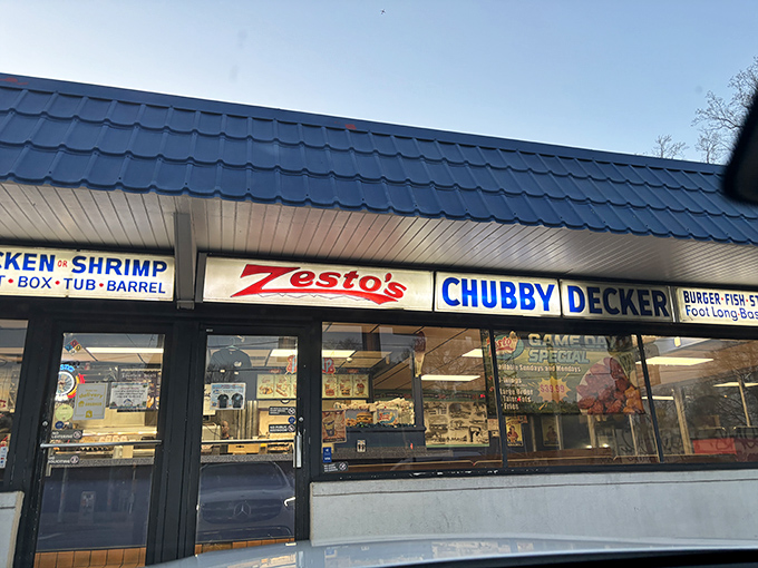 The distinctive blue roof and vintage cartoon chicken beckon like old friends. Zesto's East Atlanta location has the comforting permanence of a neighborhood landmark.