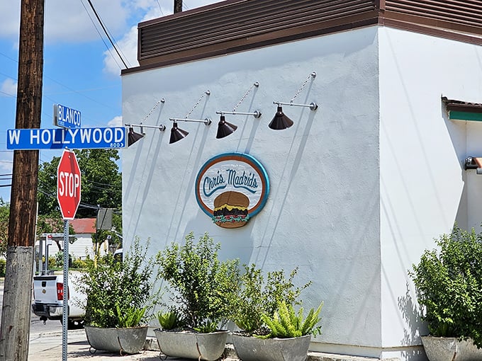 The corner of Blanco and Hollywood marks the spot where burger dreams come true at Chris Madrid's iconic white building. 