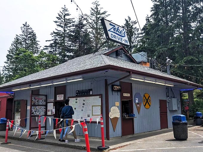 Simplicity at its finest: The iconic blue and white Zeke's sign beckons hungry travelers like a lighthouse for those navigating the sea of Highway 2 hunger pangs.